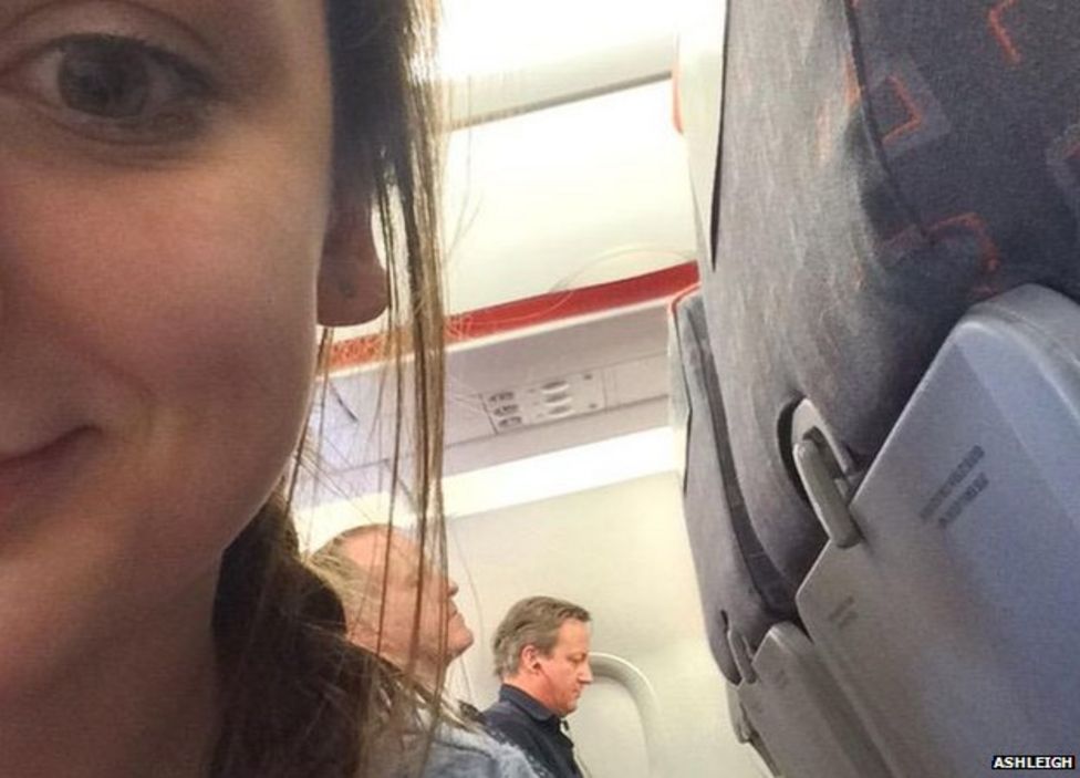 Girl films Cameron eating Pringles on an Easyjet flight - BBC News