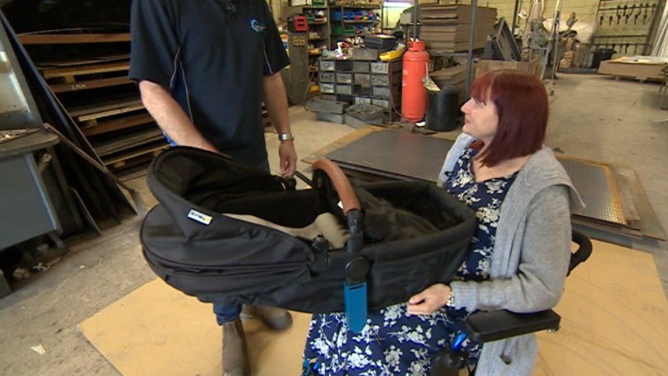 Mother-to-be gifted pram adapted for wheelchairs - BBC News