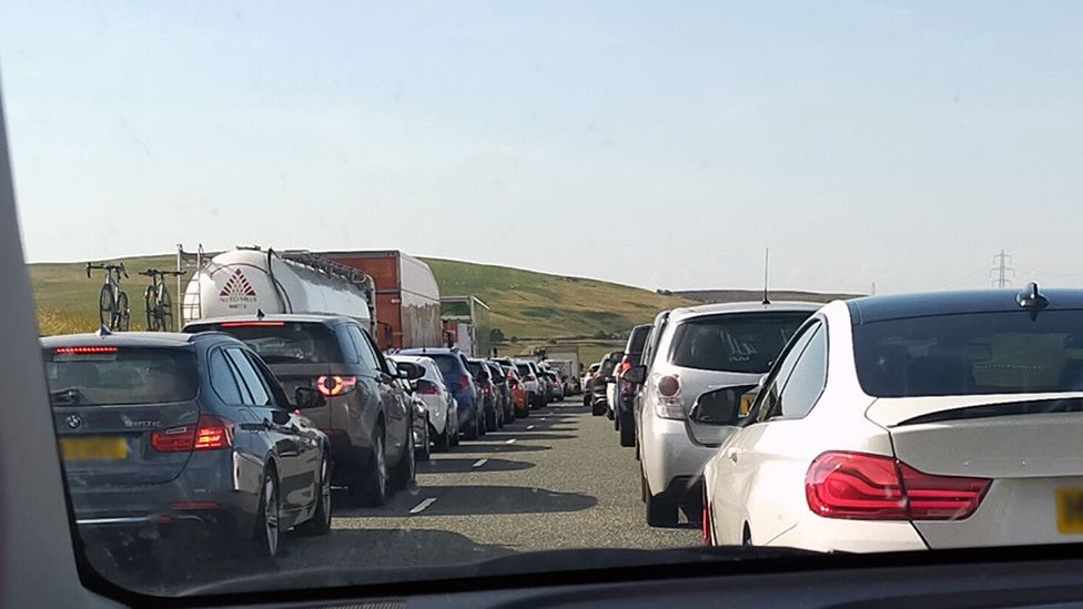 Motorcyclist dies in M74 crash with car and two bikes - BBC News