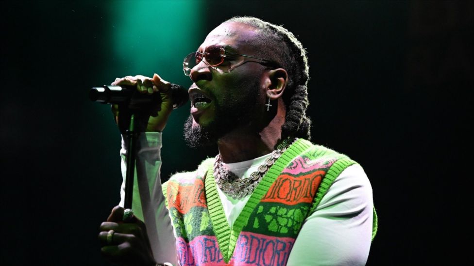 Essex typewriter artist surprised by Burna Boy's response - BBC News