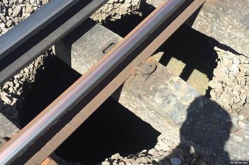 Forest Hill 13-ft-deep hole opens under railway line - BBC News