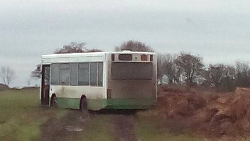 'Lost' bus ends up in manure heap on Thaxted farm - BBC News
