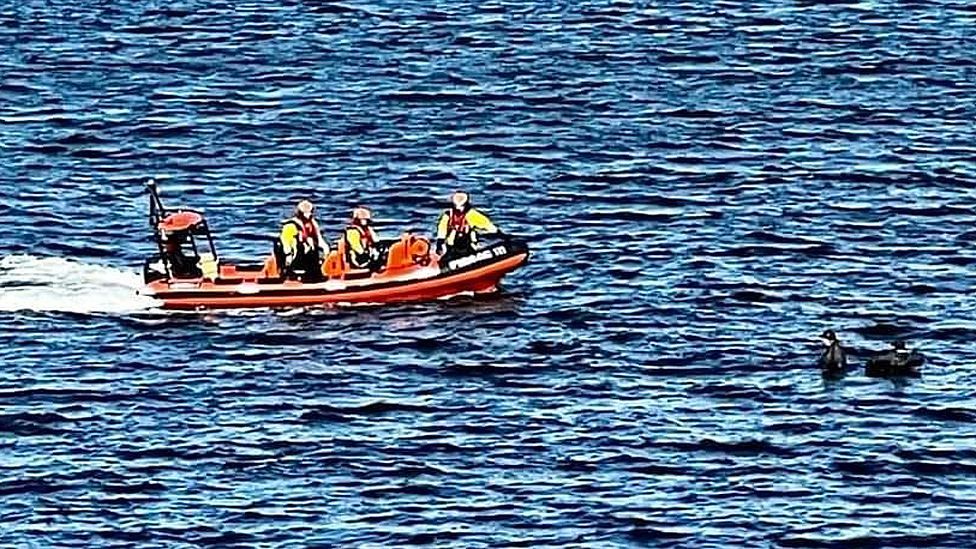 Anglers rescued after getting stuck on River Luce sandbar - BBC News