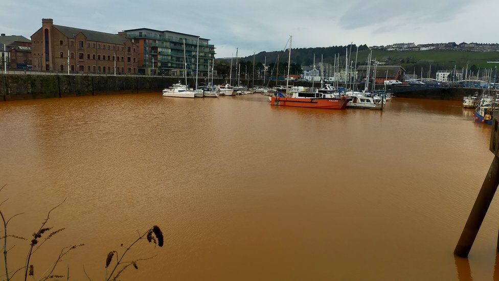 Plans agreed to tackle Whitehaven Harbour's discoloured water - BBC News