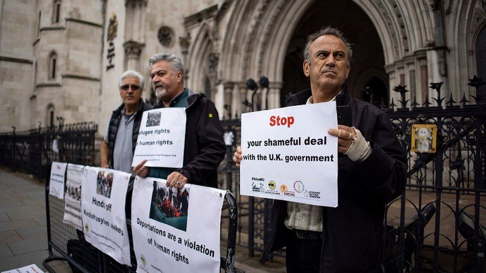 Courts rules government plans to send asylum seekers to Rwanda unlawful - BBC Newsround