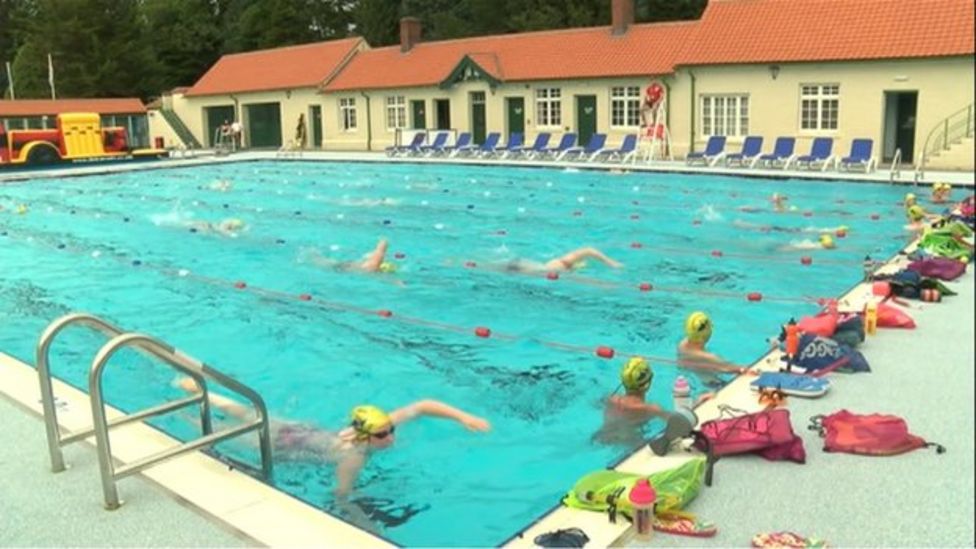 Free swimming as revamped Pontypridd lido opens - BBC News