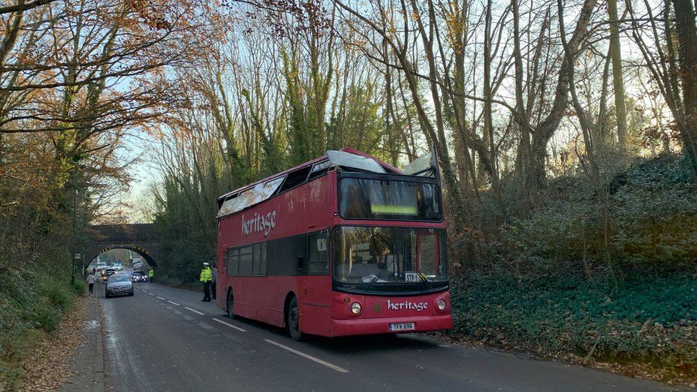 School bus roof crushed in Hassocks bridge strike - BBC News