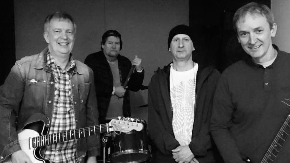 Sheffield Covid coma musician relearns guitar for comeback - BBC News