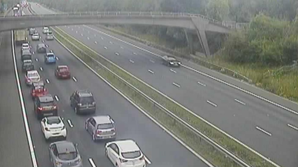 M4 traffic: Vehicle fire leads to long queues on motorway - BBC News