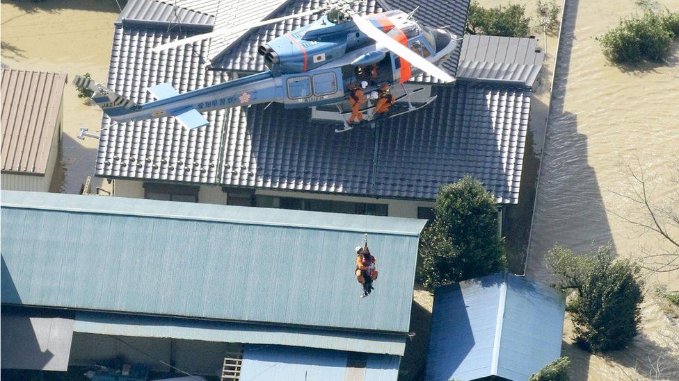 Japan floods: Rescue work continues amid deadly floods - BBC News