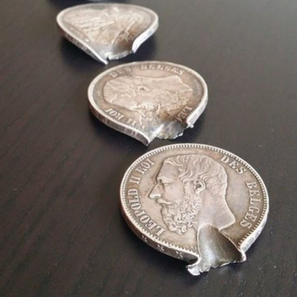 These coins stopped a bullet and saved a soldier's life - BBC News