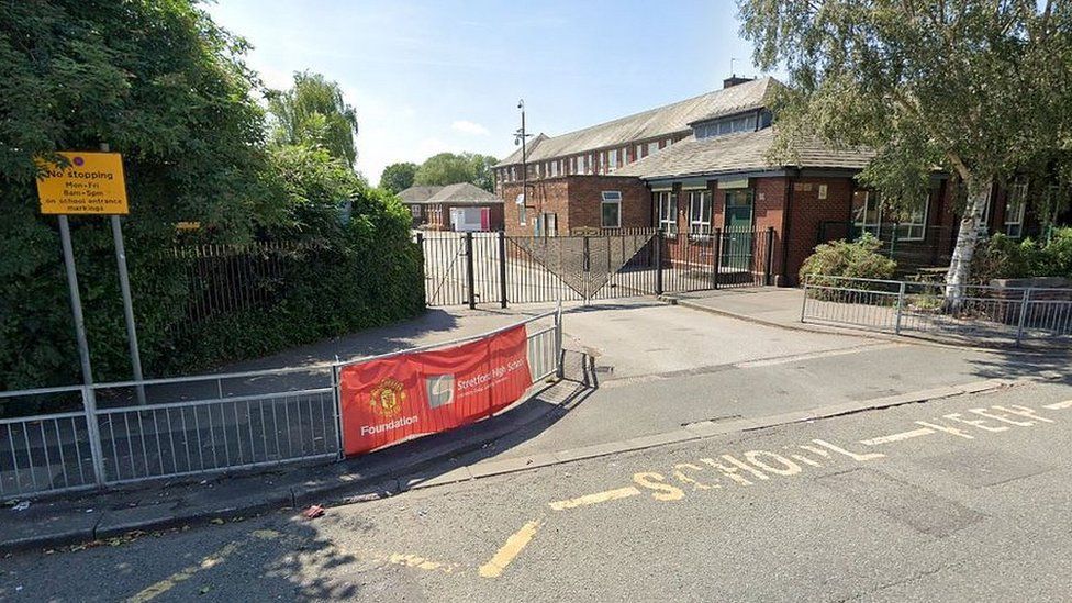 Stretford High School shuts as several staff self-isolate - BBC News
