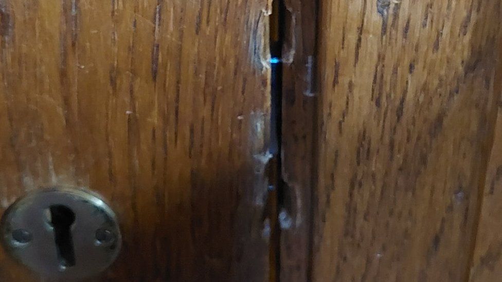 Silver church cross 'caked' in bleach after failed theft - BBC News