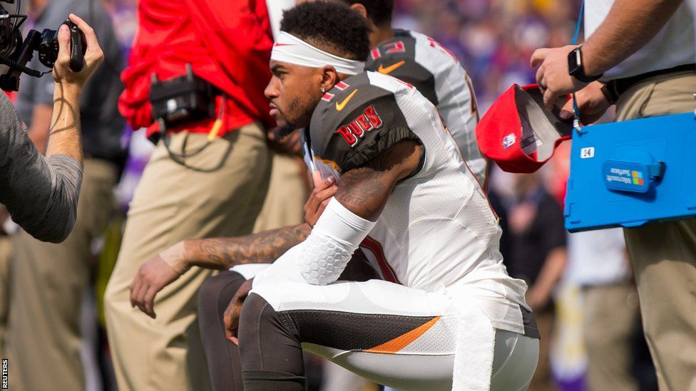 NFL players protest during national anthem after President Trump ...