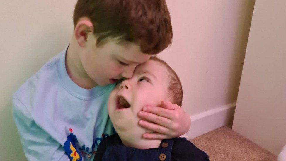 Boy tackles Three Peaks Challenge during Storm Babet for charity - BBC News