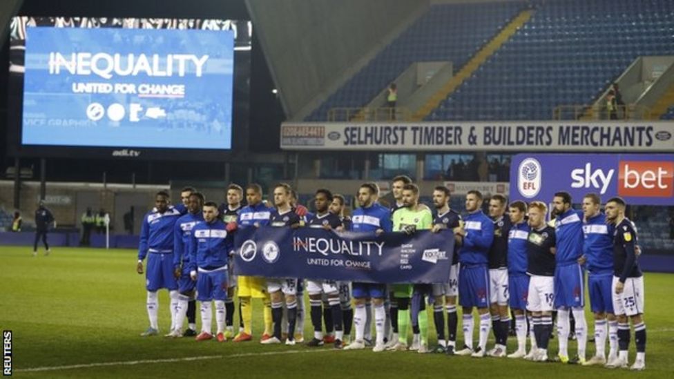 Millwall fans applaud as players unite behind anti-racism banner before ...