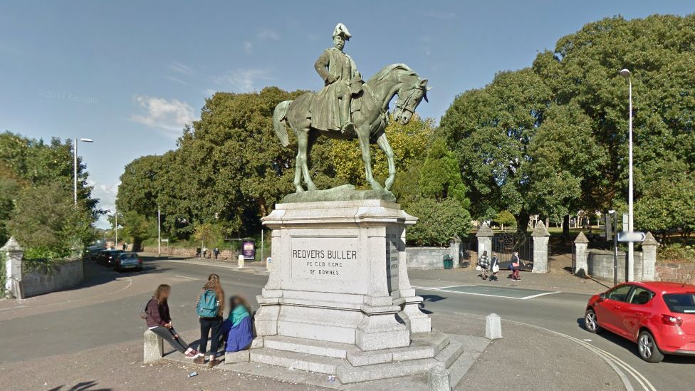 Man dies after falling from statue in Exeter - BBC News