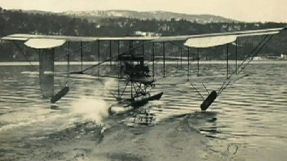 Waterbird: Replica of UK's first seaplane flies over Windermere - BBC News