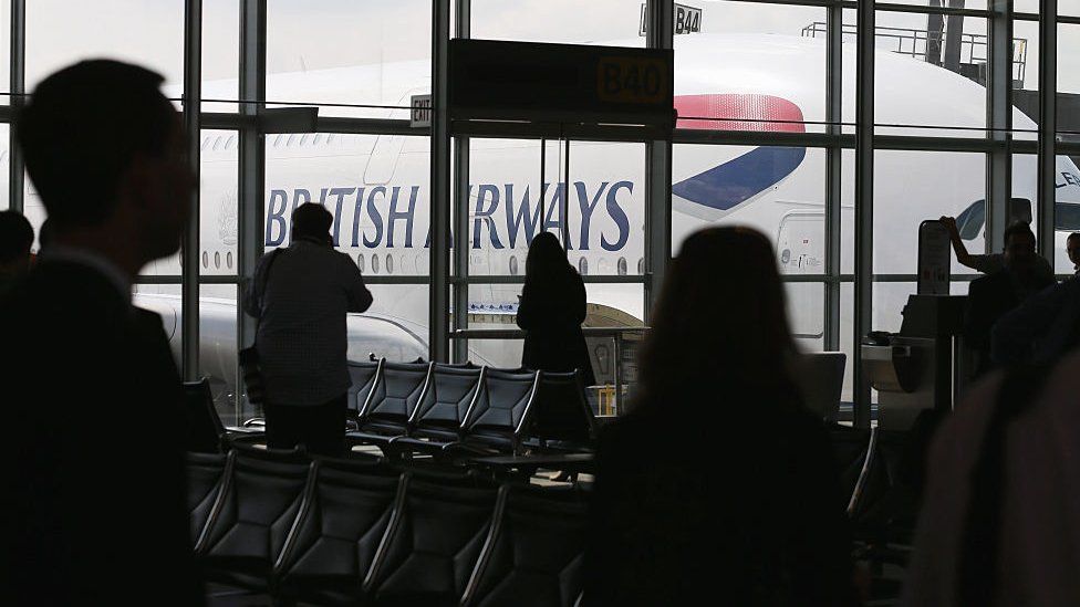 BA owner IAG slows growth plans after Brussels attacks - BBC News