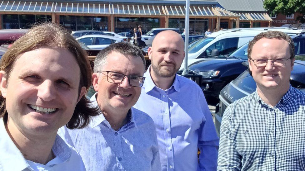 Banking hub to open in Holt after community campaign - BBC News