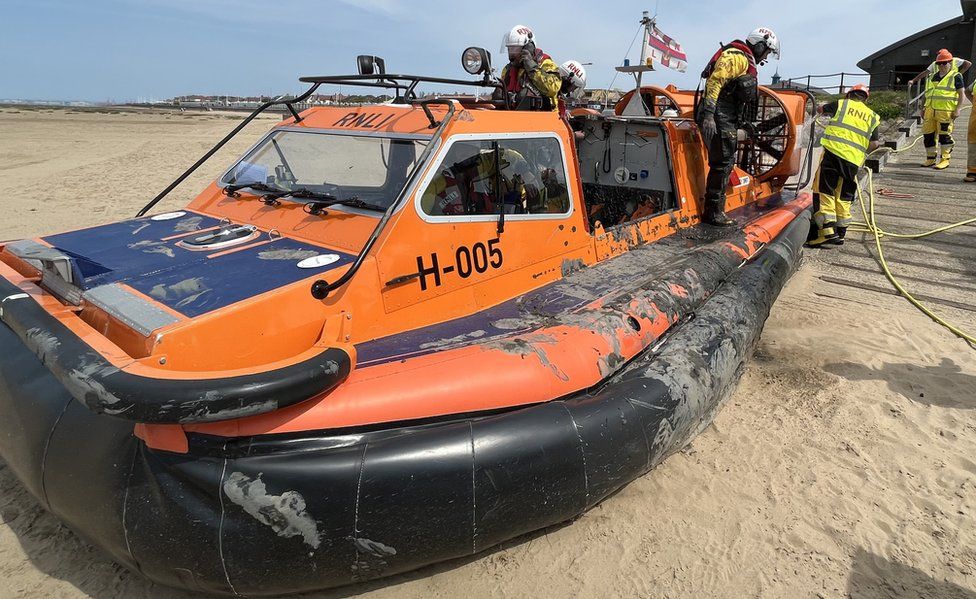 Hoylake RNLI hovercraft rescues woman stuck in waist-deep mud - BBC News