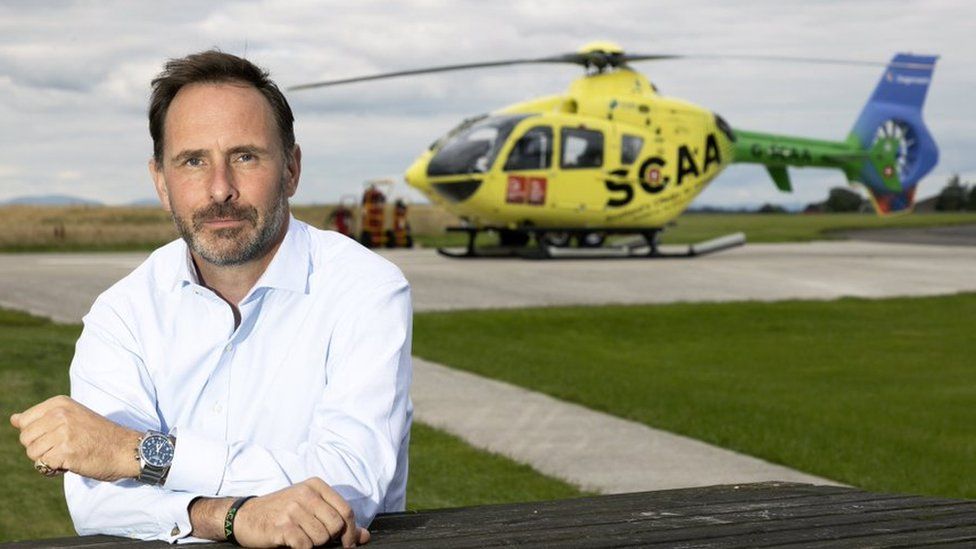 Tributes after air ambulance founder John Bullough dies suddenly - BBC News