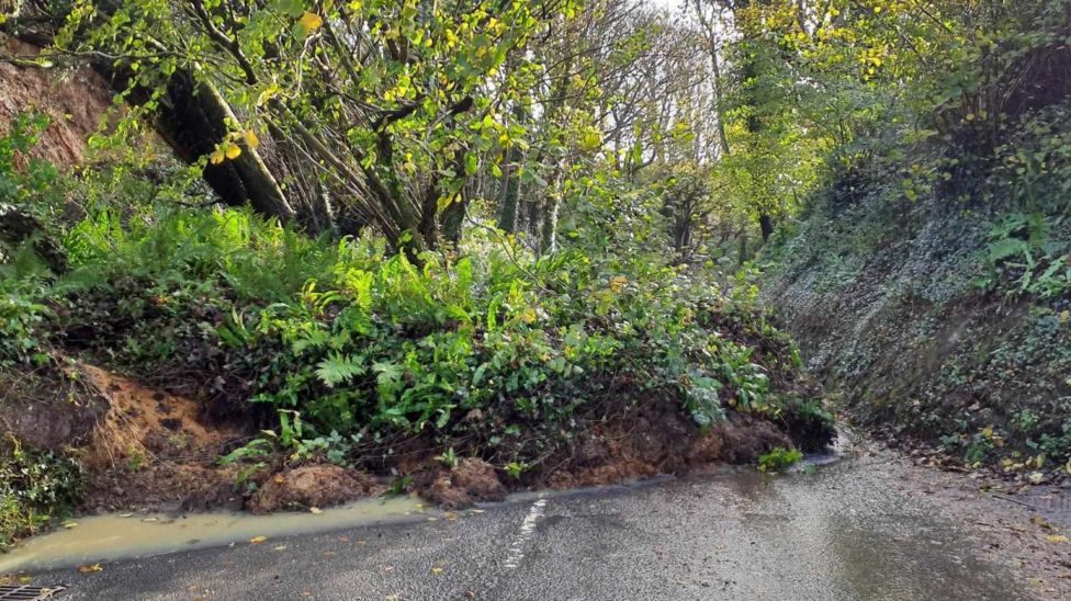 Isle of Wight landslide closes village access road - BBC News