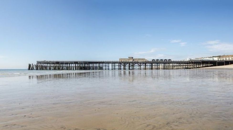 Hastings Pier sold to Eastbourne Pier owner Sheikh Abid Gulzar - BBC News
