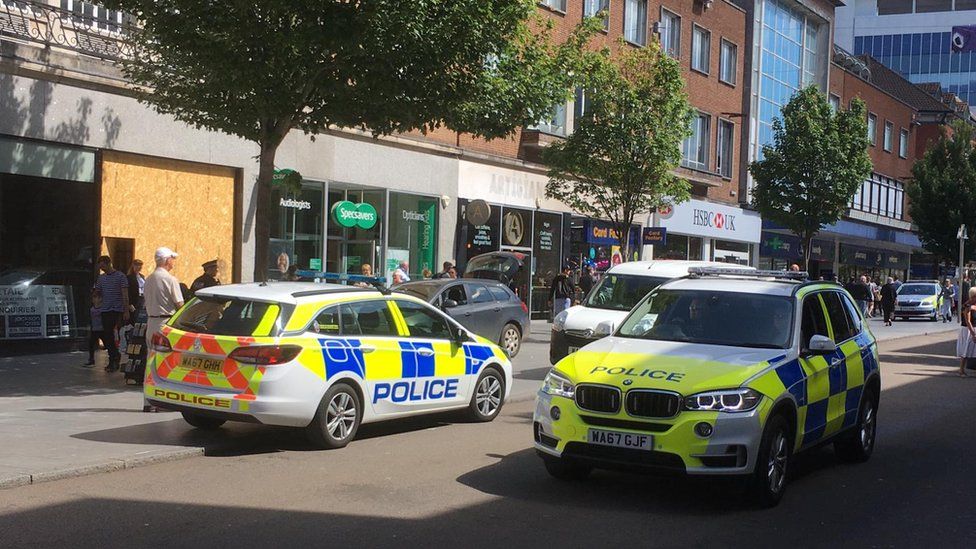 Man found dead outside burgled shop in Exeter - BBC News