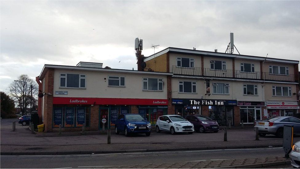 Child dropped from window during Clacton flat fire - BBC News