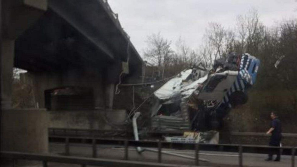Lorry crash driver dies in Essex A12 bridge fall - BBC News