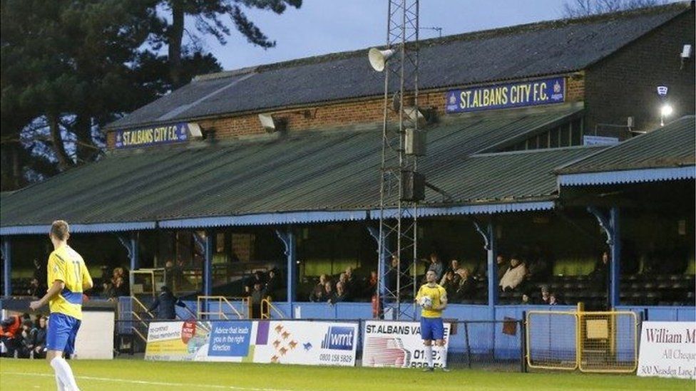Man dies after falling from St Albans City Football Club roof - BBC News