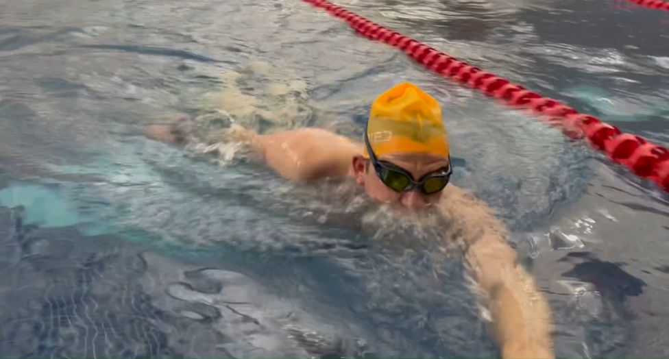 Dudley: Swimmers complete fundraising relay in memory of Iain Hughes ...