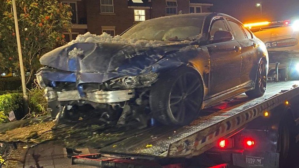 Dudley flats evacuated after car hits building - BBC News