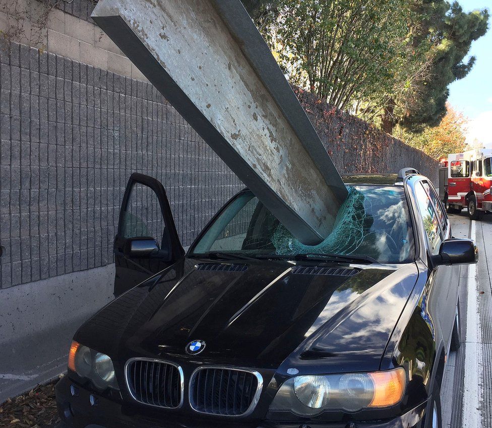 California driver's lucky escape after beam pierces car - BBC News