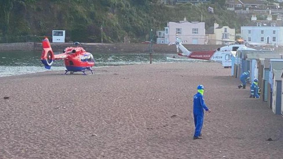 Unconscious free-diver rescued and taken to hospital - BBC News