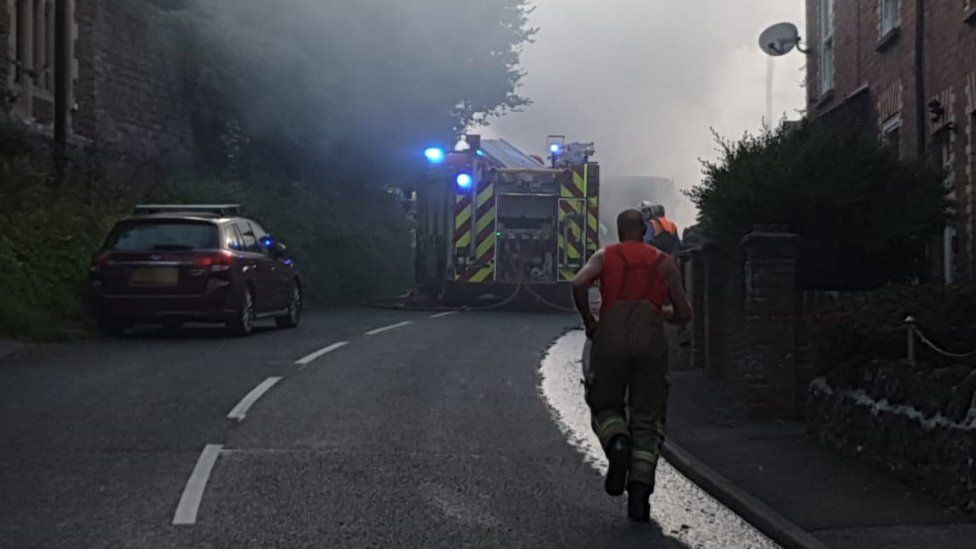 Inquiry after bus carrying passengers catches fire - BBC News