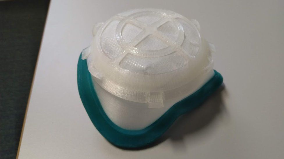 Covid: Fitted face masks designed after nurse's struggle - BBC News