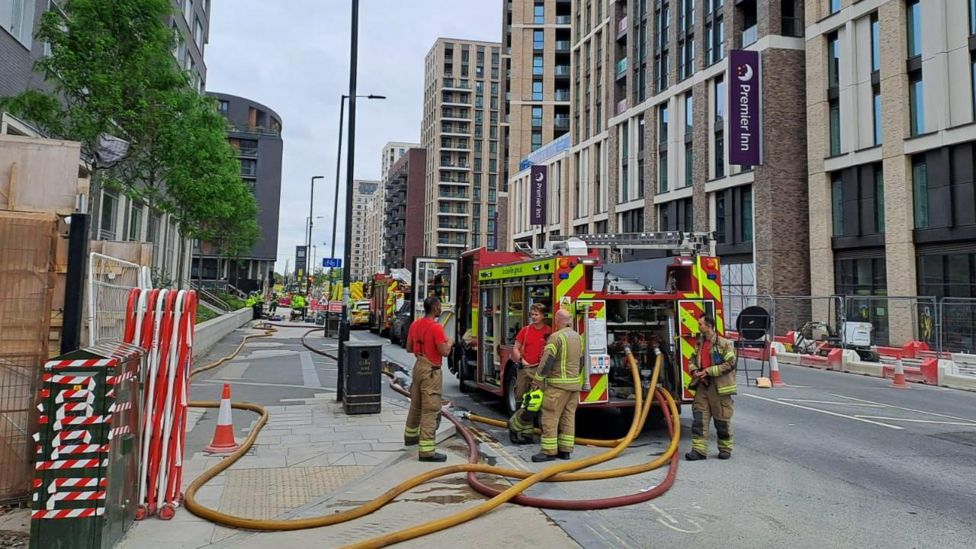 Canning Town: Seven hospitalised after fire at construction site - BBC News