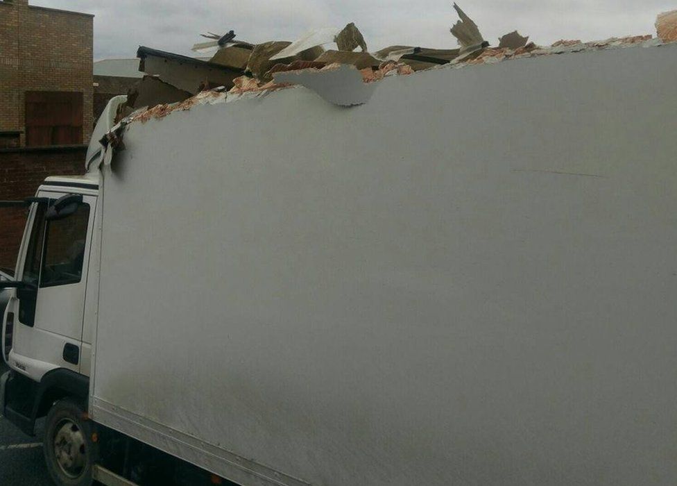 Banbridge lorry driver hits bridge, slices off roof and drives on - BBC ...