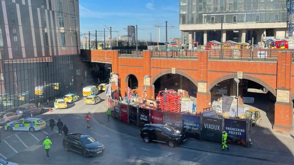 Worker injured in explosion at Manchester construction site - BBC News
