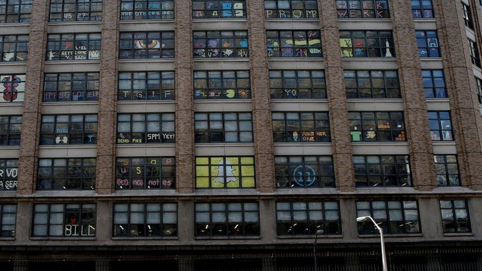Pictures: The sticky note window art battle between two buildings in ...