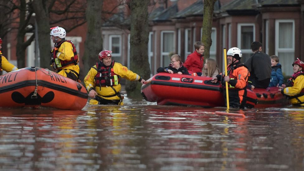 'Smiling' donkey in floods rescue - BBC Newsround