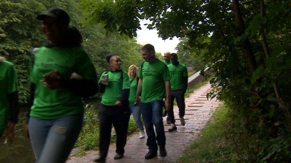 Freed Birmingham inmates walk 100 miles to give back to society - BBC News