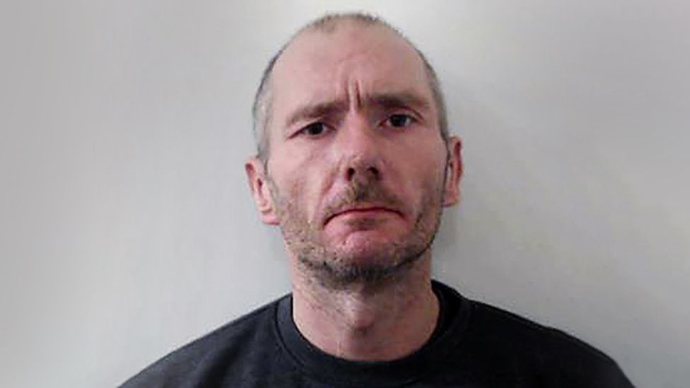 Man jailed for murdering neighbour in garden attack - BBC News