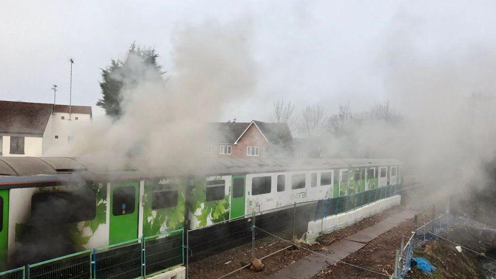 Ten evacuated as Kenilworth train catches fire - BBC News