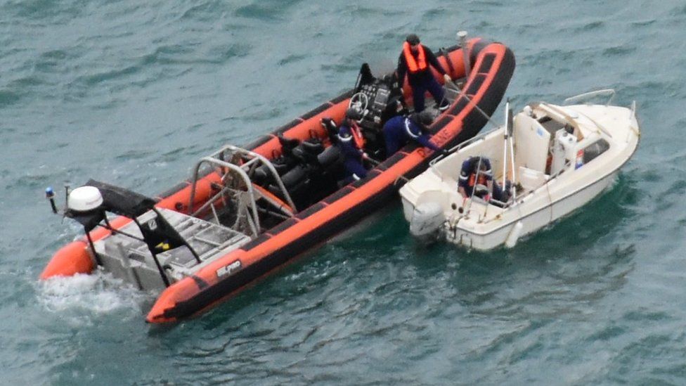 Channel migrants: Six men found in dinghy and brought to Dover - BBC News
