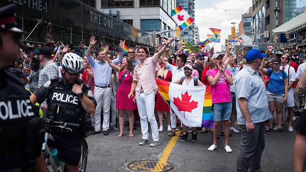 Canada cities are banning police from Pride parades - BBC News