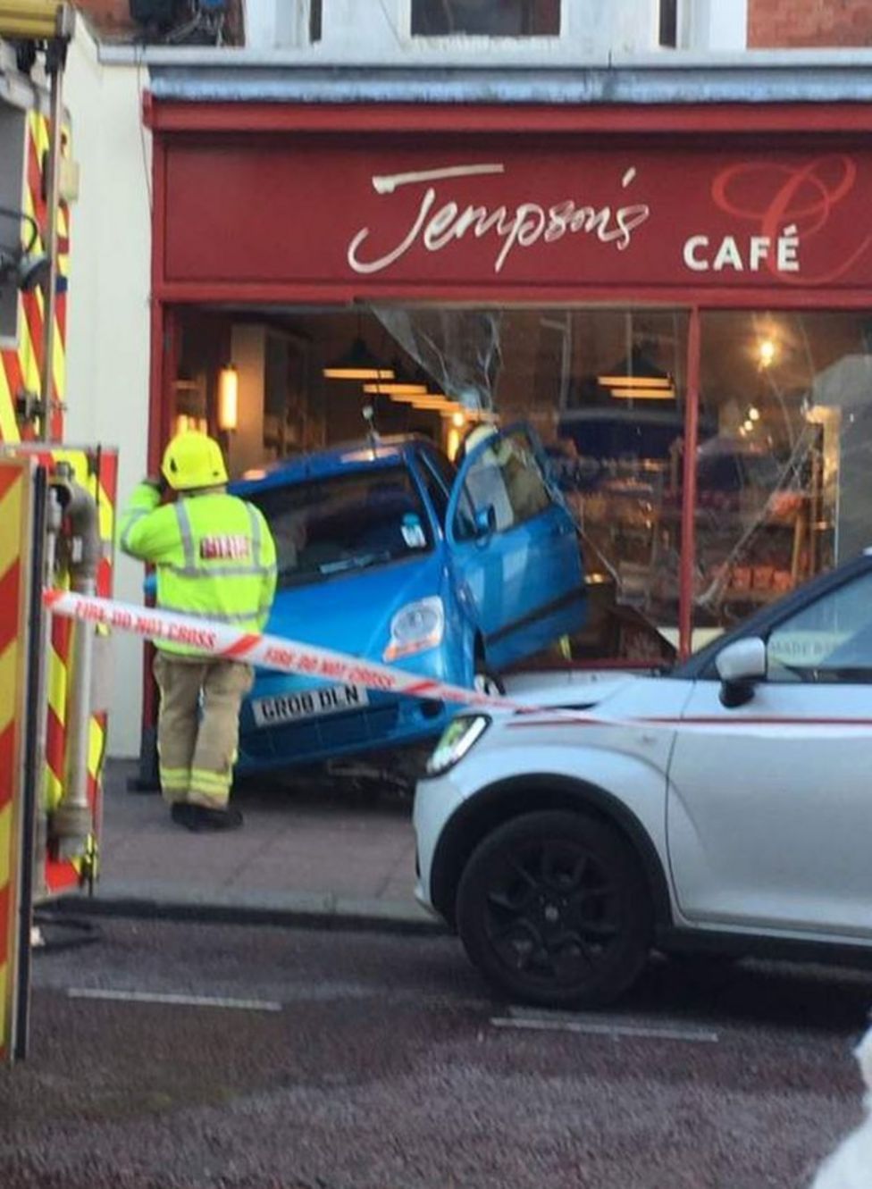 Person rescued after car crashes into Bexhill cafe - BBC News