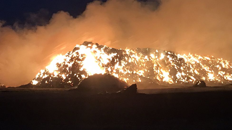 Hemswell fire: Huge straw bale blaze could burn 'for weeks' - BBC News